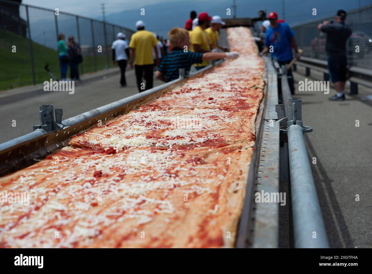 5000 pounds of dough, 3600 pounds of cheese, 2 cubic meters of Italian ...