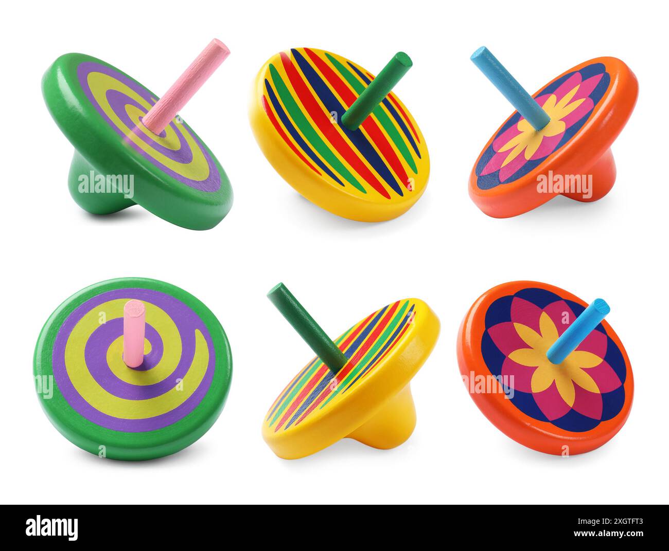 Yellow green spinning tops Cut Out Stock Images & Pictures - Alamy
