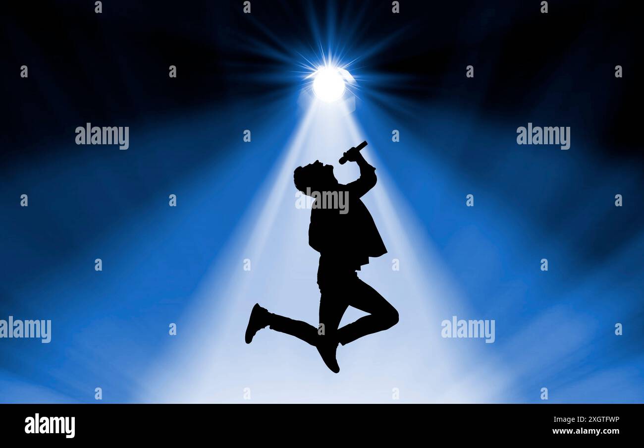 Silhouette of singer on stage in spotlight Stock Photo - Alamy