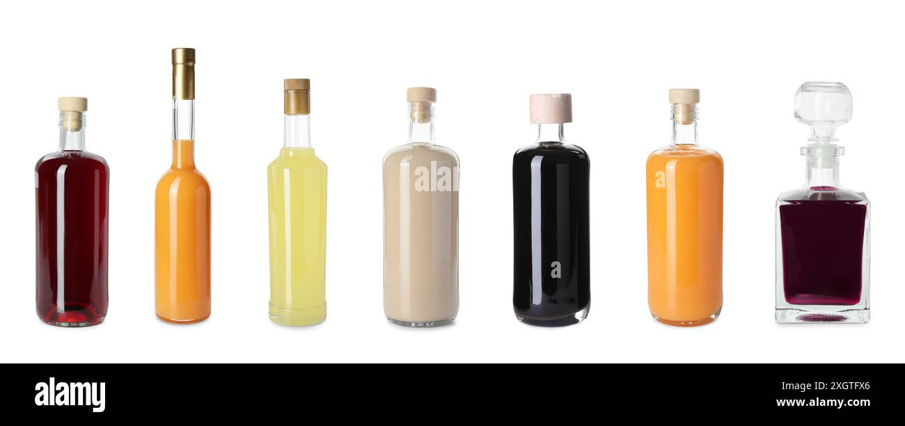 Collection of different tasty liqueurs on white background Stock Photo ...