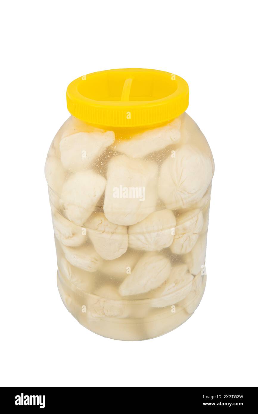 Sheep and goat cheese pickled in a five-pound container. Ready-to ...