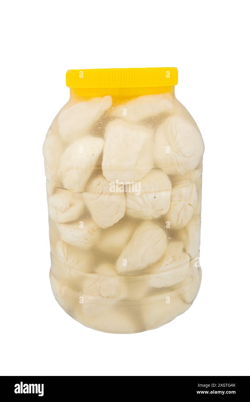 Sheep and goat cheese pickled in a five-pound container. Ready-to ...