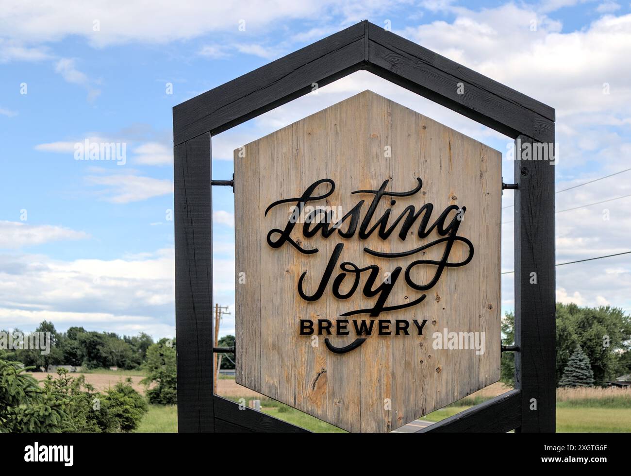 Tivoli, NY, USA - May 29, 2024: Lasting Joy Brewery logo sign near barn ...