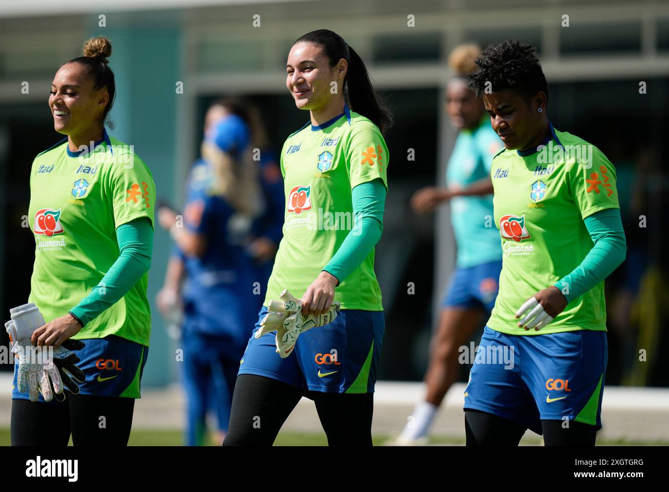 Brazilian goalkeepers Natasha, left, Lorena, center, and Luciana arrive ...