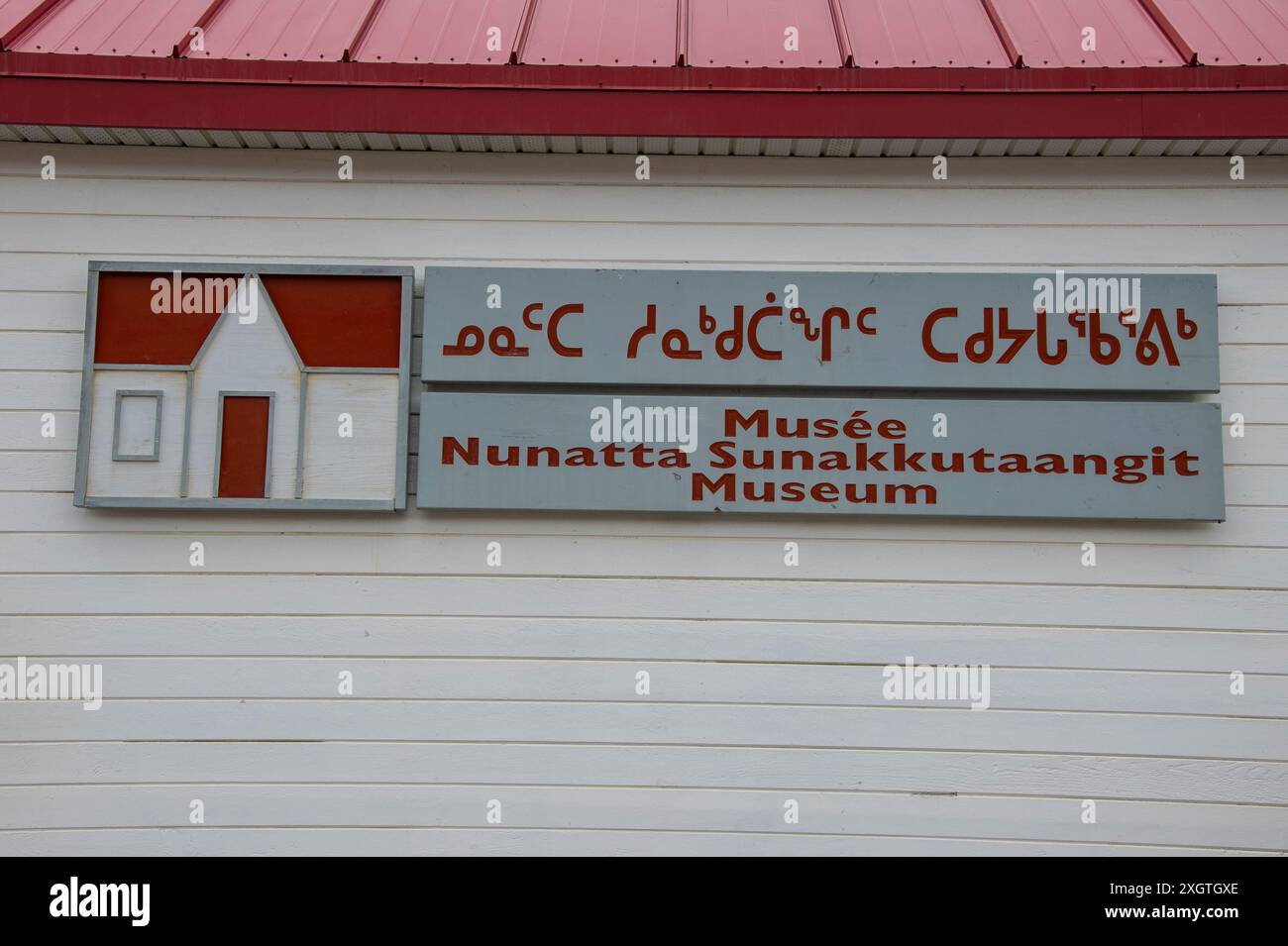Multilingual Nunatta Sunakkutaangit Museum sign in English, French and ...