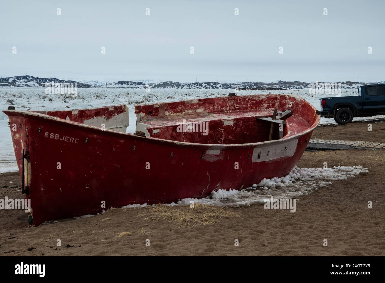 Red boat, a historic landmark at Red Boat Beach in Apex, Nunavut ...