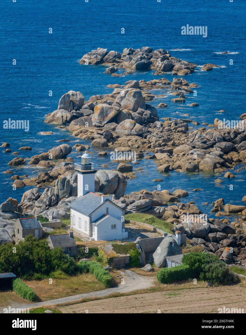 Aerial view of Pontusval Lighthouse and the beaches. Plounéour ...