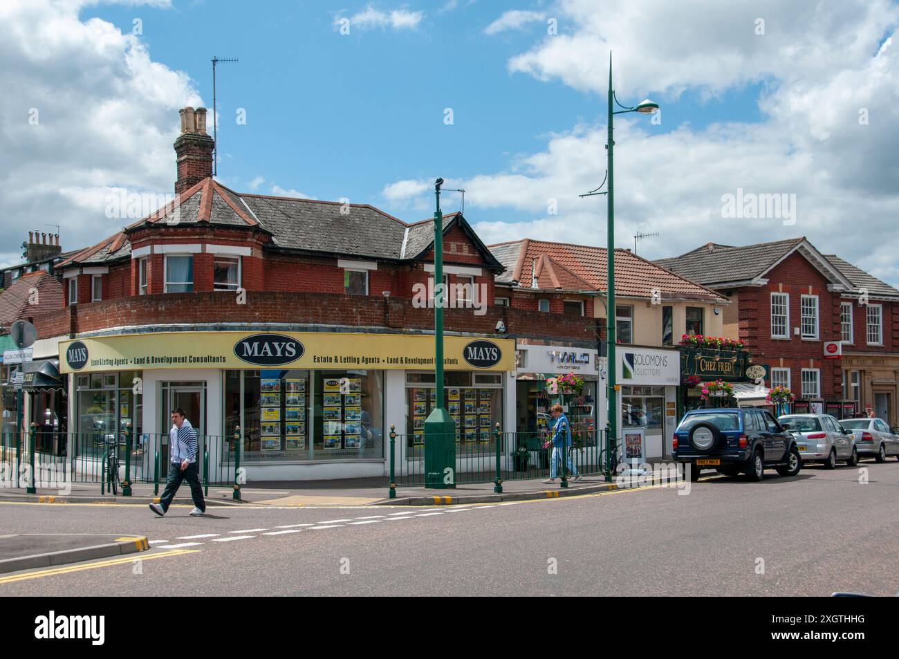 Shops in a high street Stock Photo - Alamy