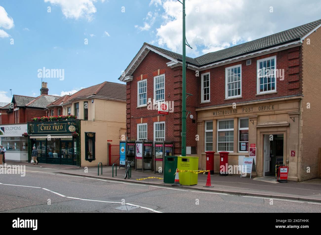 Shops in a high street Stock Photo - Alamy