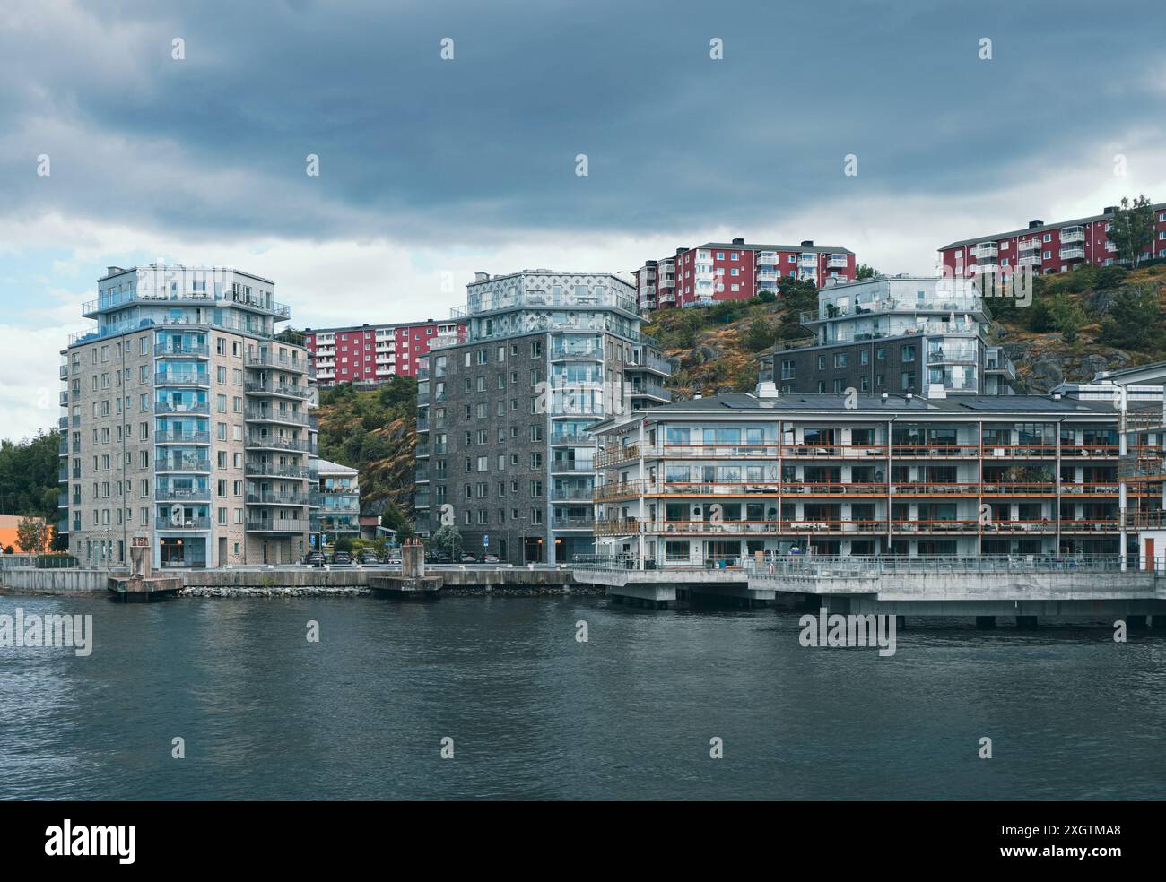 View of modern apartment buildings at the water Stock Photo - Alamy