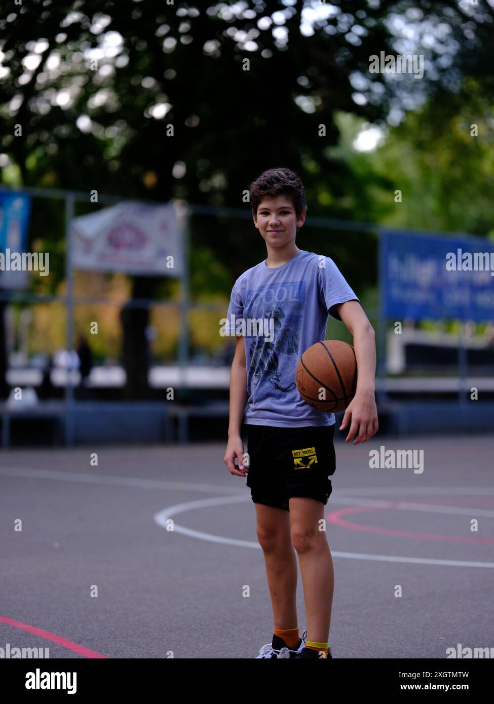 Beautiful boy playing basketball hi-res stock photography and images ...