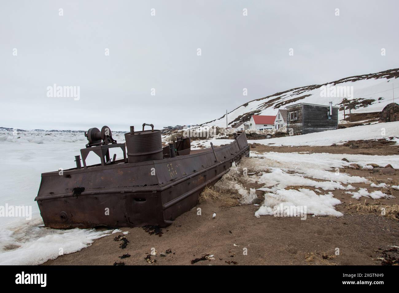 Rusty steel barge on Red Boat Beach in Apex, Nunavut, Canada Stock ...