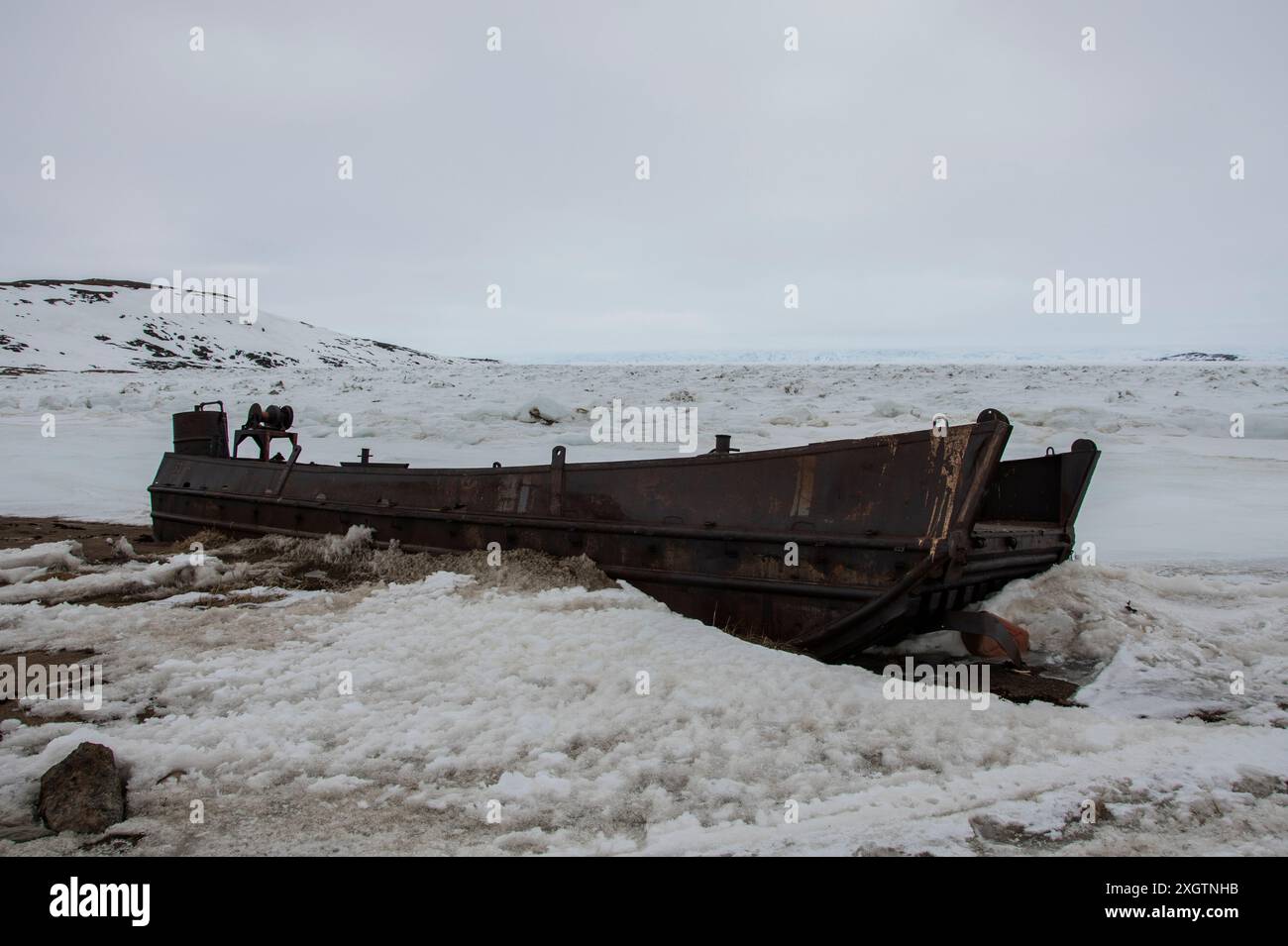 Rusty steel barge on Red Boat Beach in Apex, Nunavut, Canada Stock ...