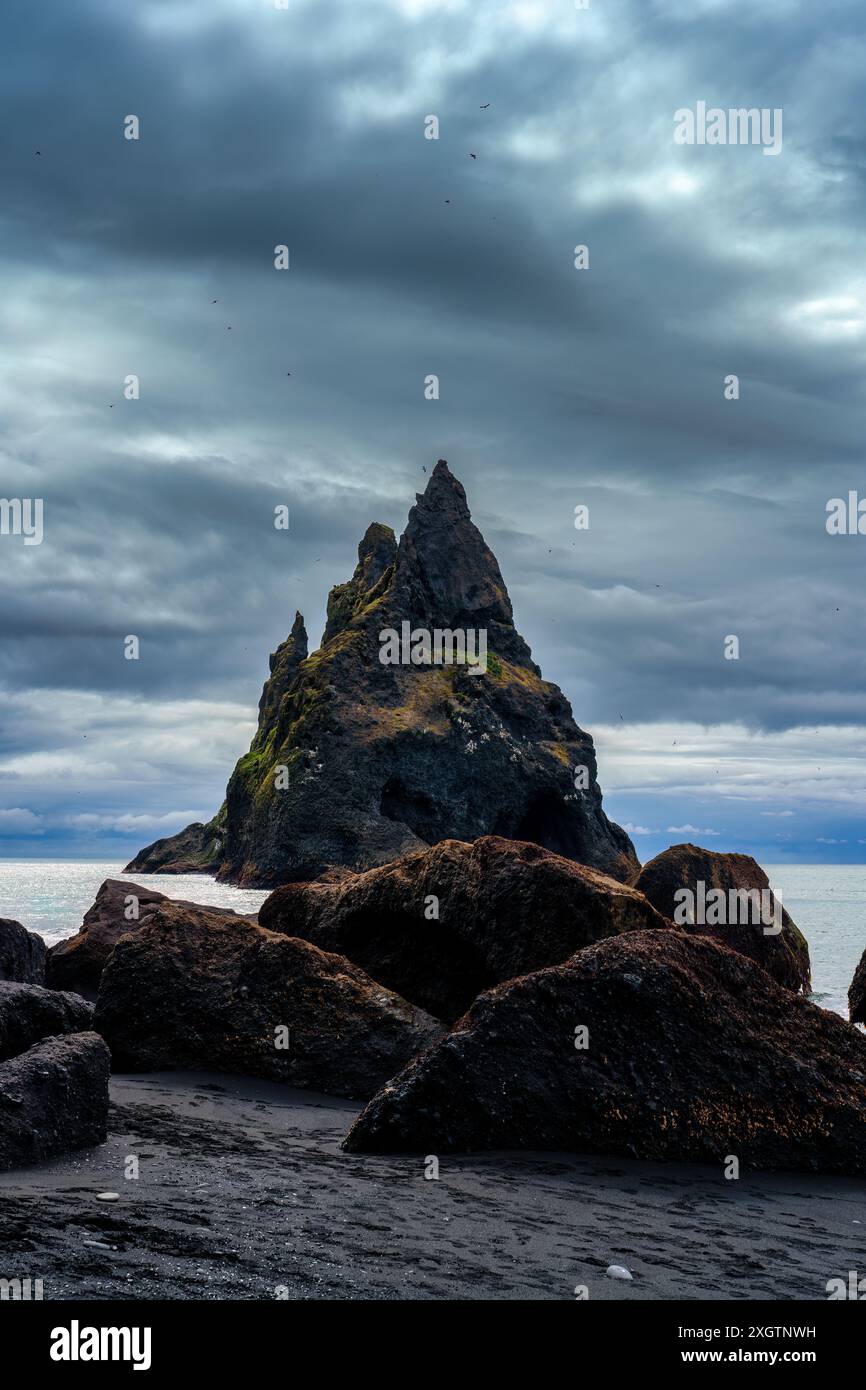 Moody Reynisdragar natural rock formation on Reynisfjara black sand ...