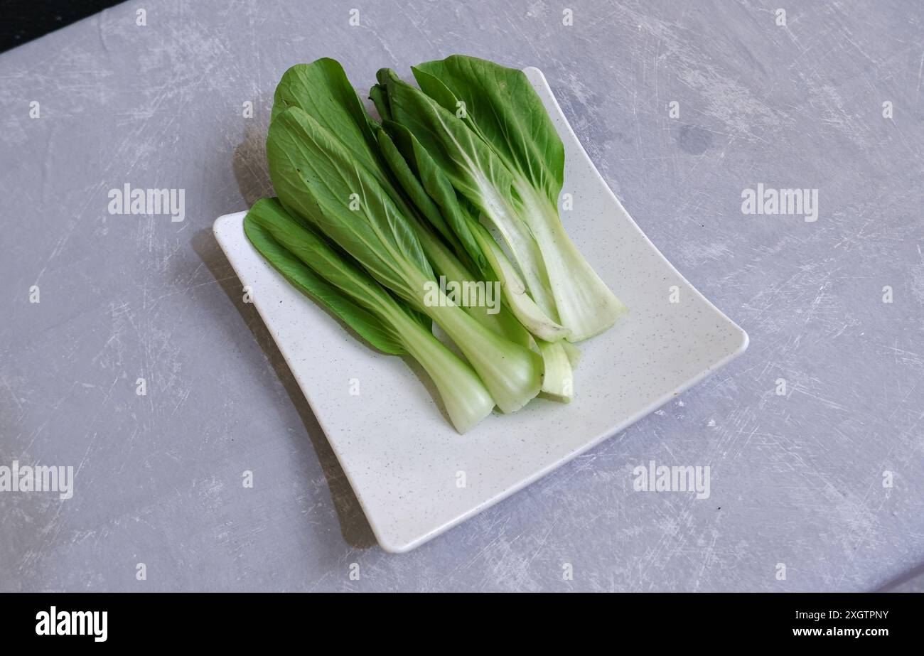 Fresh bok choy vegetable on the plate Stock Photo - Alamy