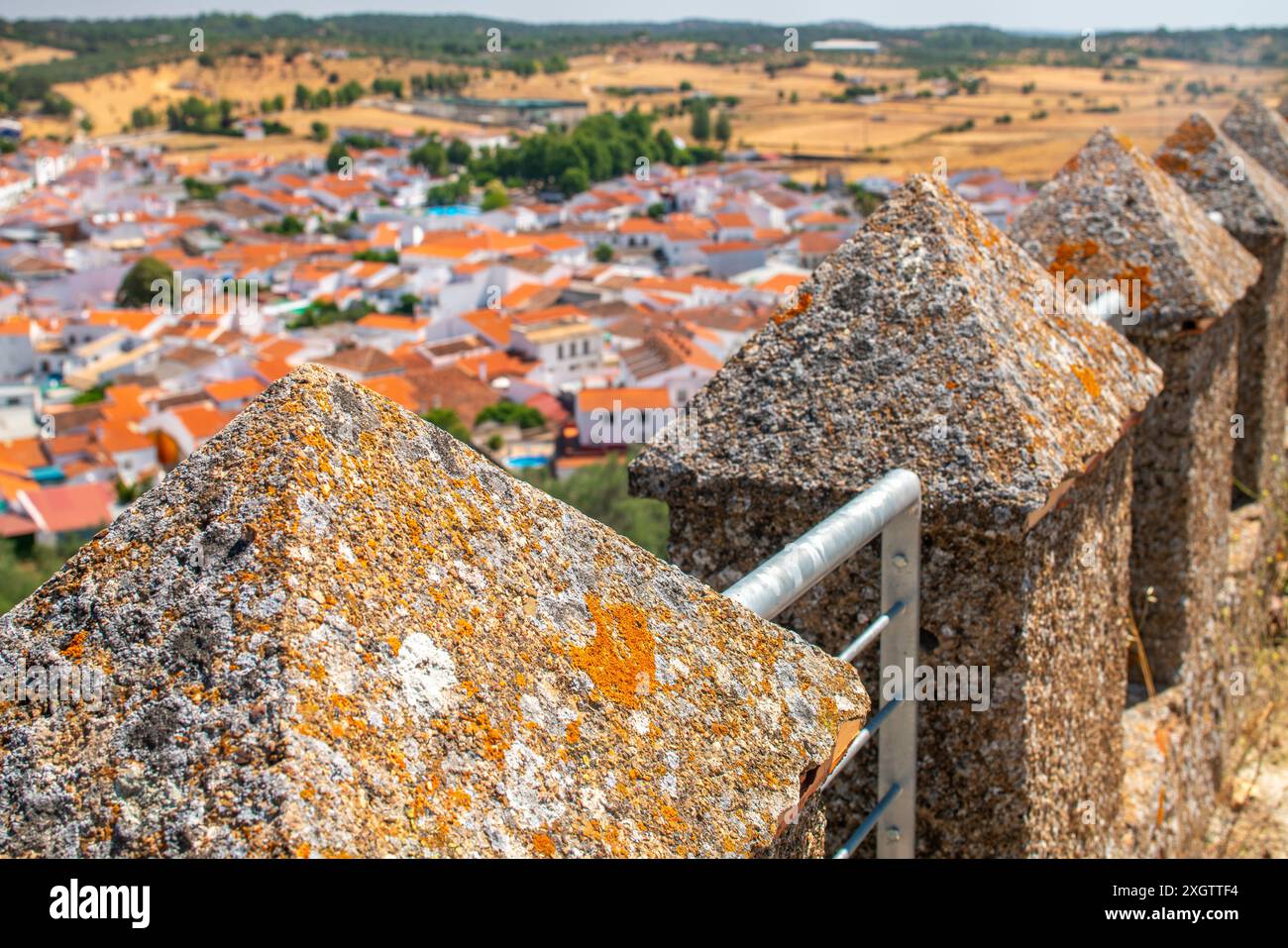Picturesque view of Alanis de la Sierra town with red rooftops seen ...