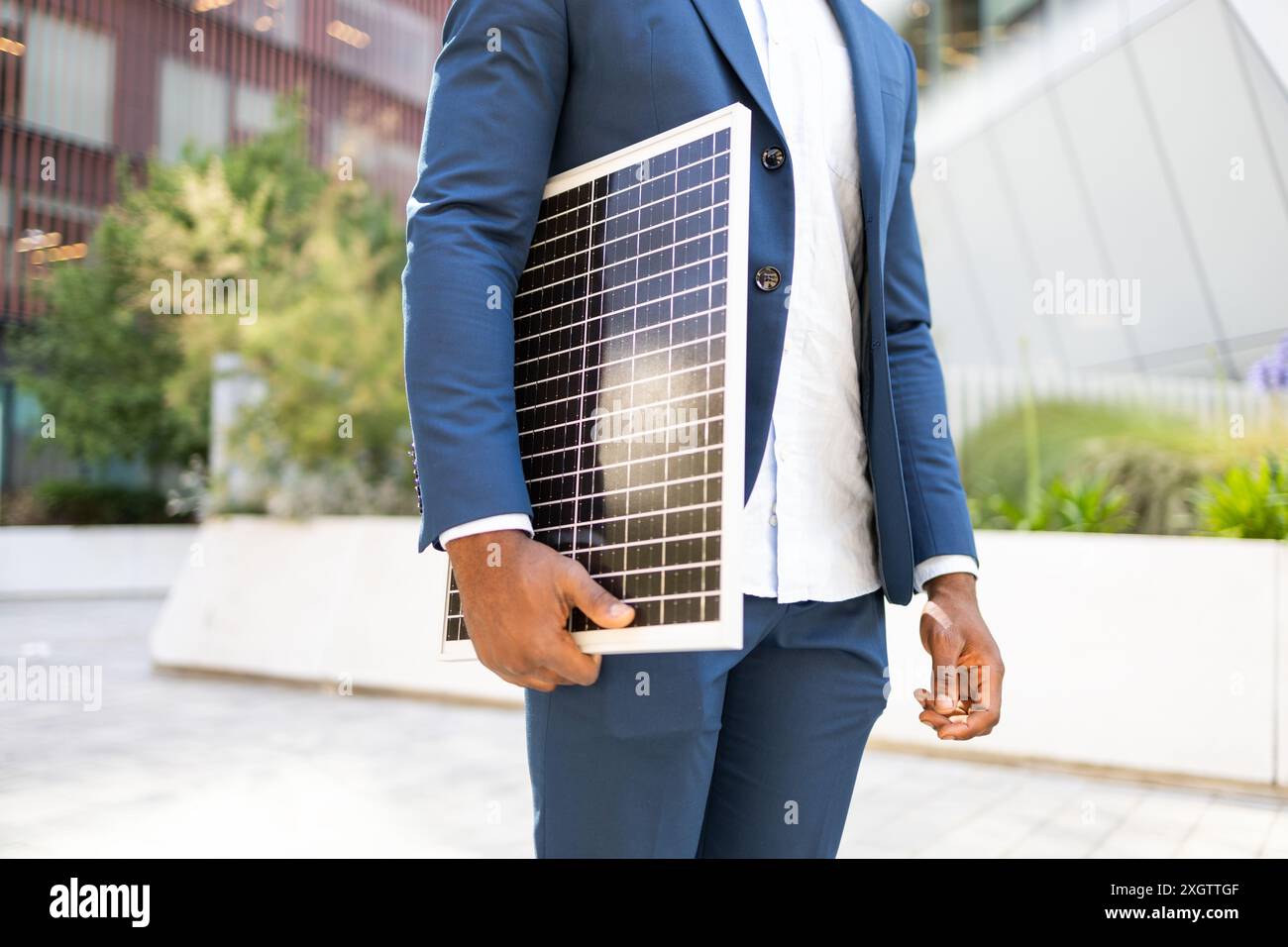 African man holding solar panel hi-res stock photography and images - Alamy