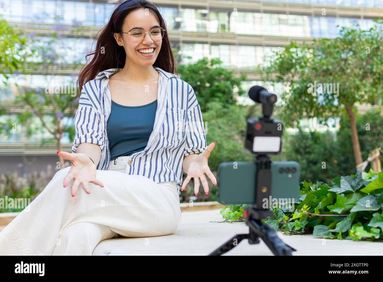 Digital influencer filming engaging hi-res stock photography and images ...