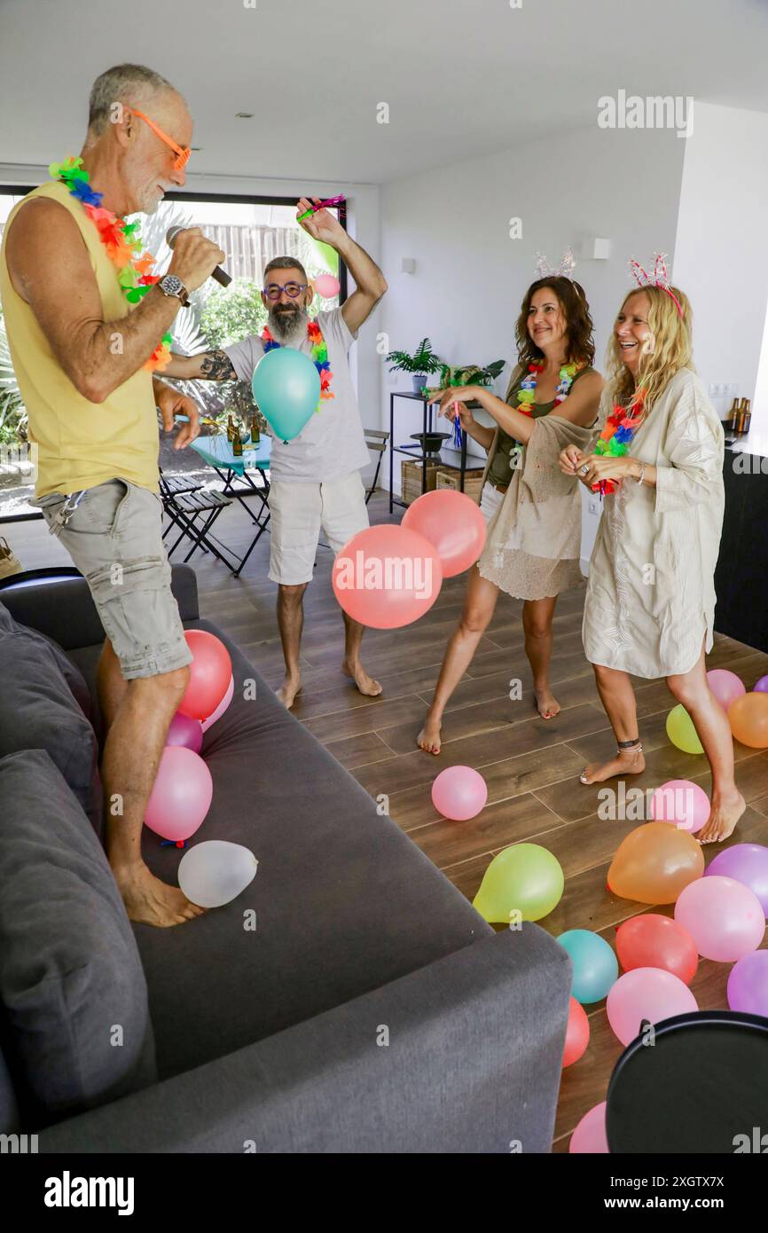 Elderly dancing balloons hi-res stock photography and images - Alamy