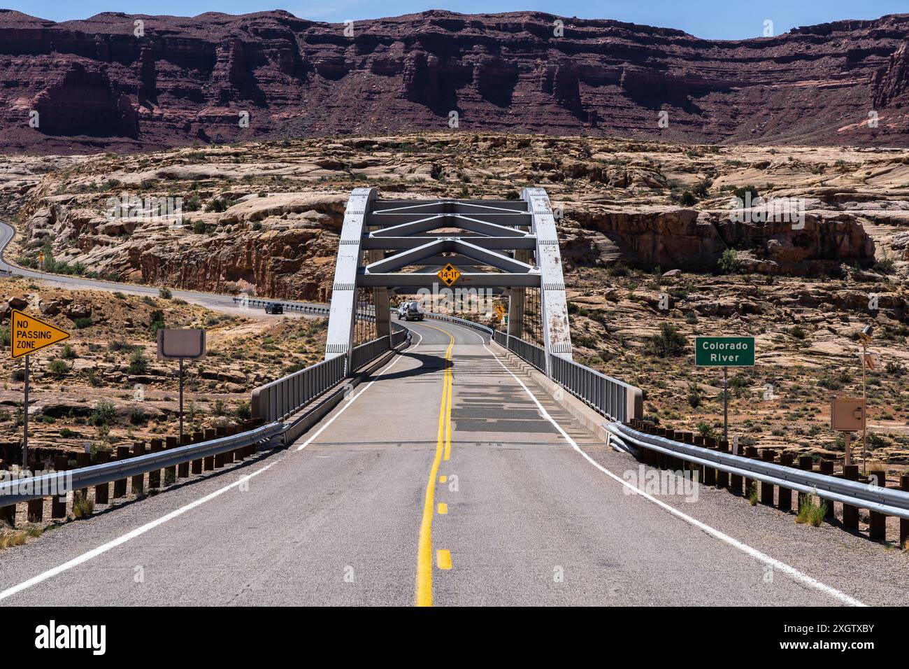 The Hite Crossing Bridge spans the Colorado River within the rugged ...