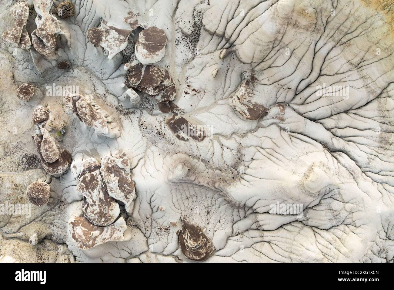 A detailed aerial shot capturing the unique geological formations and ...