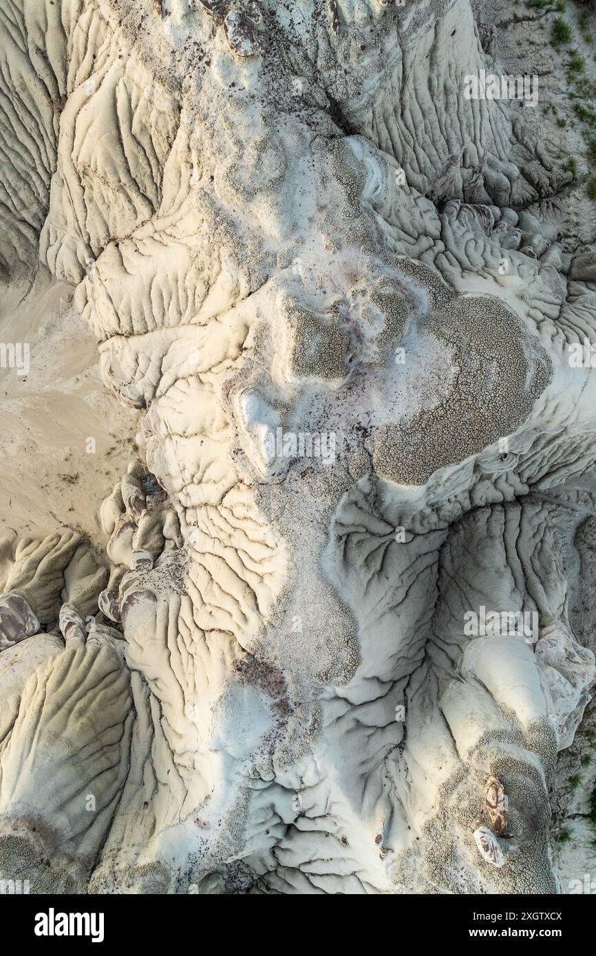 An aerial shot capturing the complex, textured surface of Bisti ...