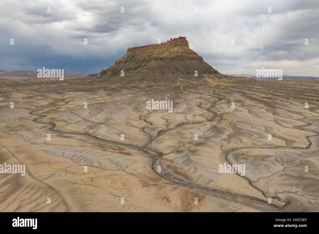 This striking aerial image captures the rugged, textured terrain and ...