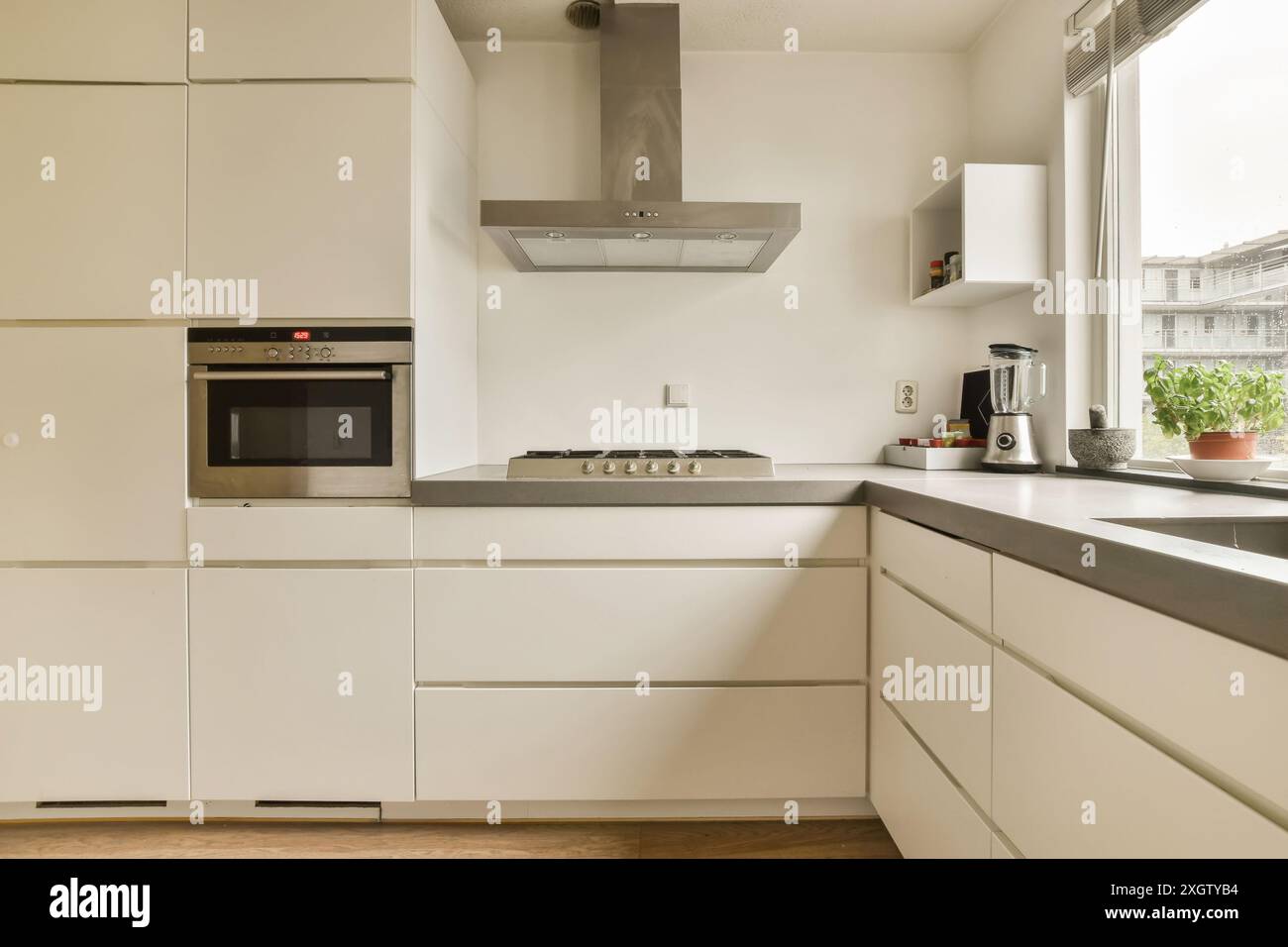 Sleek and contemporary kitchen design located in Henkenshage, Amsterdam ...