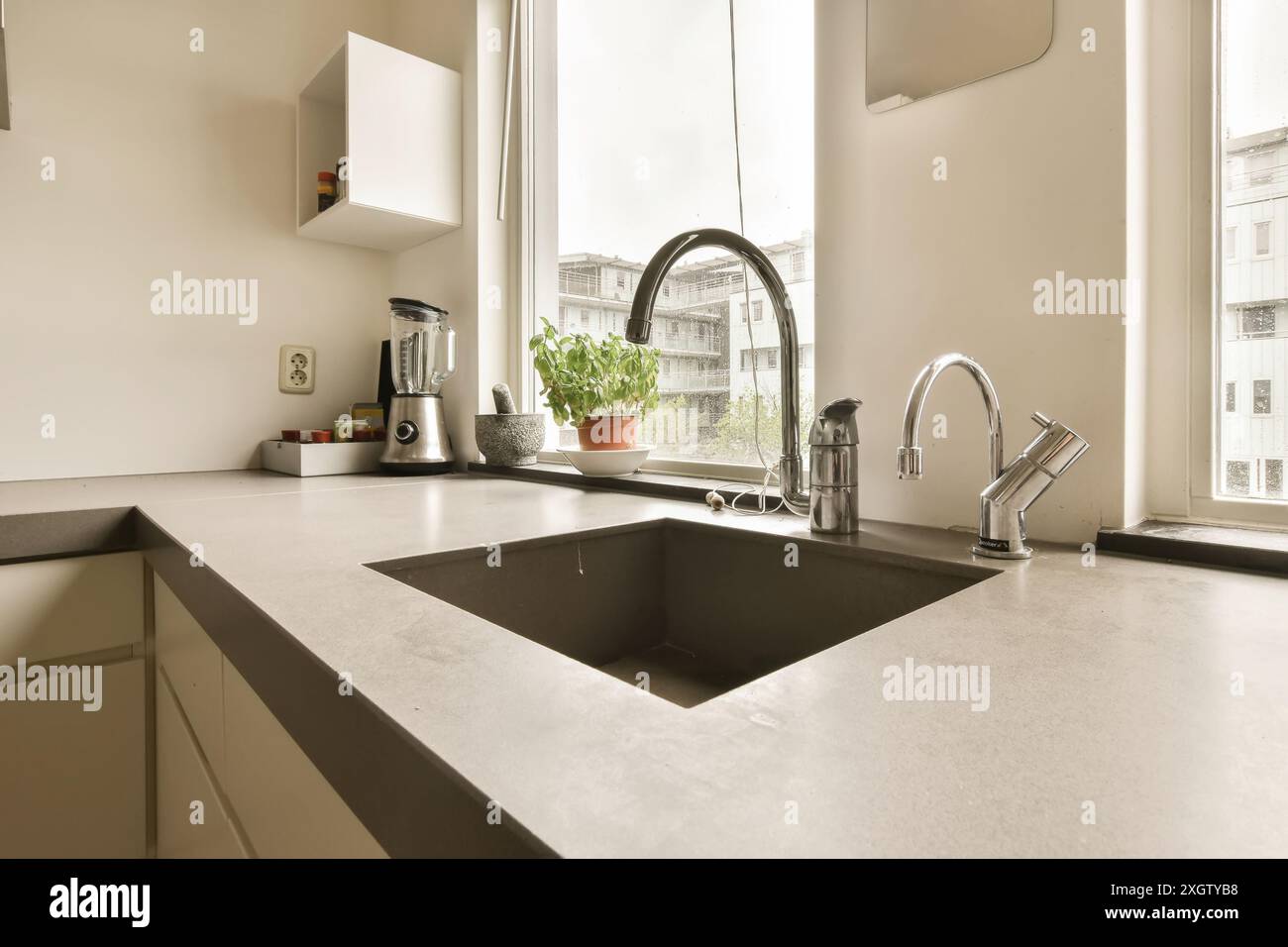 A chic, modern kitchen in Henkenshage, Amsterdam, featuring a sleek ...