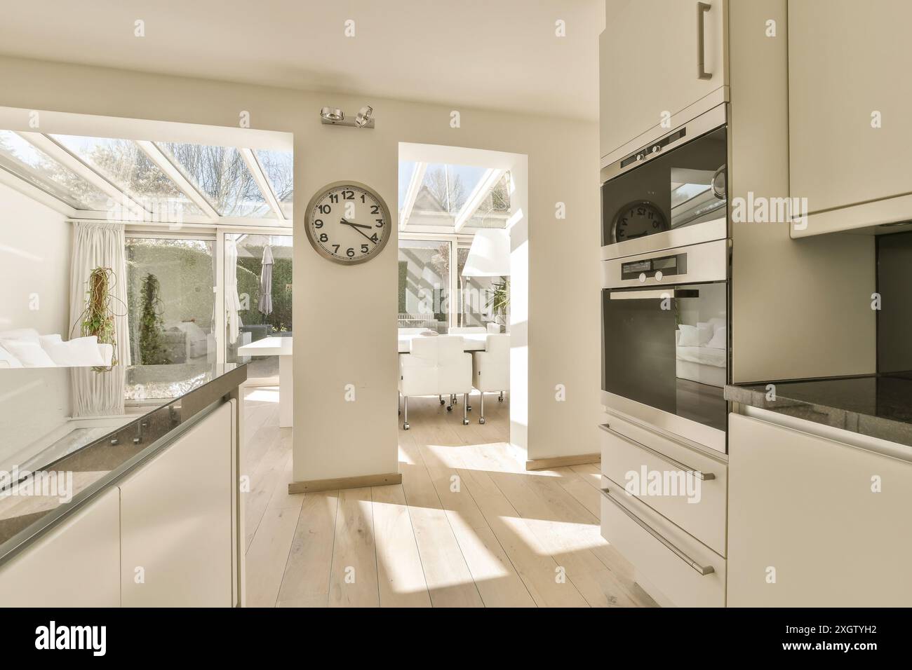 Sleek and bright modern kitchen design at Jan Weilandlaan, Netherlands ...