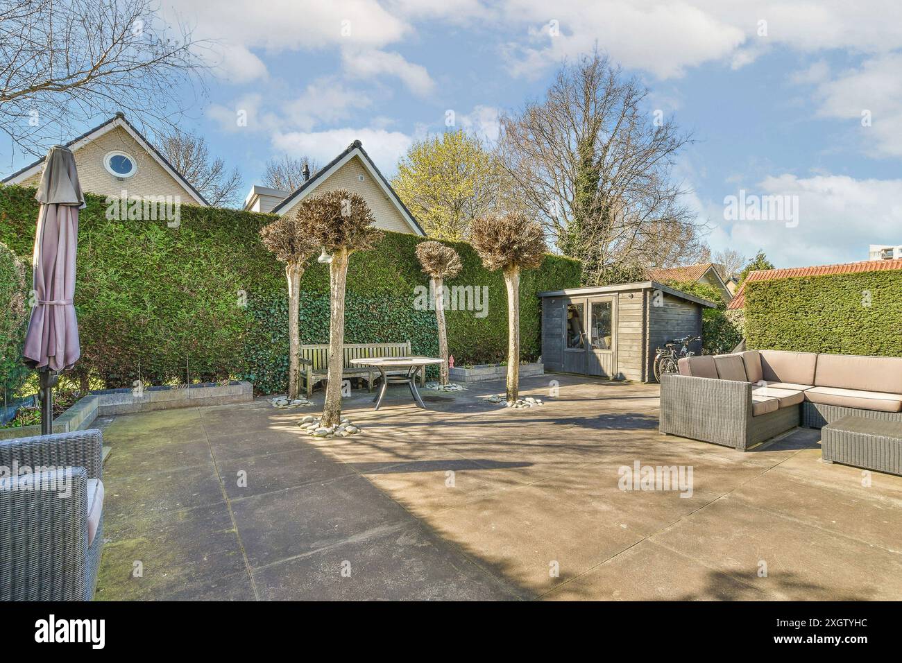 This serene backyard setting in Jan Weilandlaan, Netherlands, showcases ...