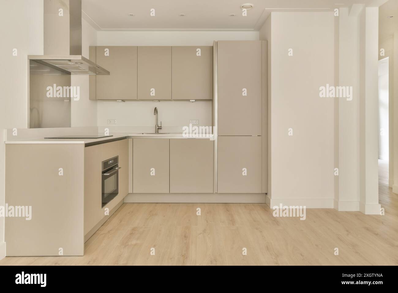 Modern kitchen interior with clean lines and neutral tones, featuring ...