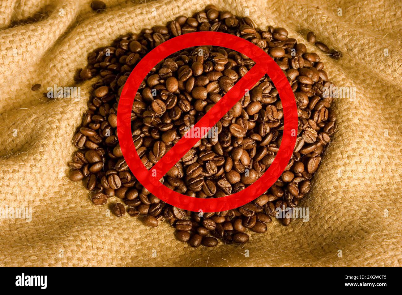 Coffee beans on canvas with warning crossed out sign. Concept of coffee ...