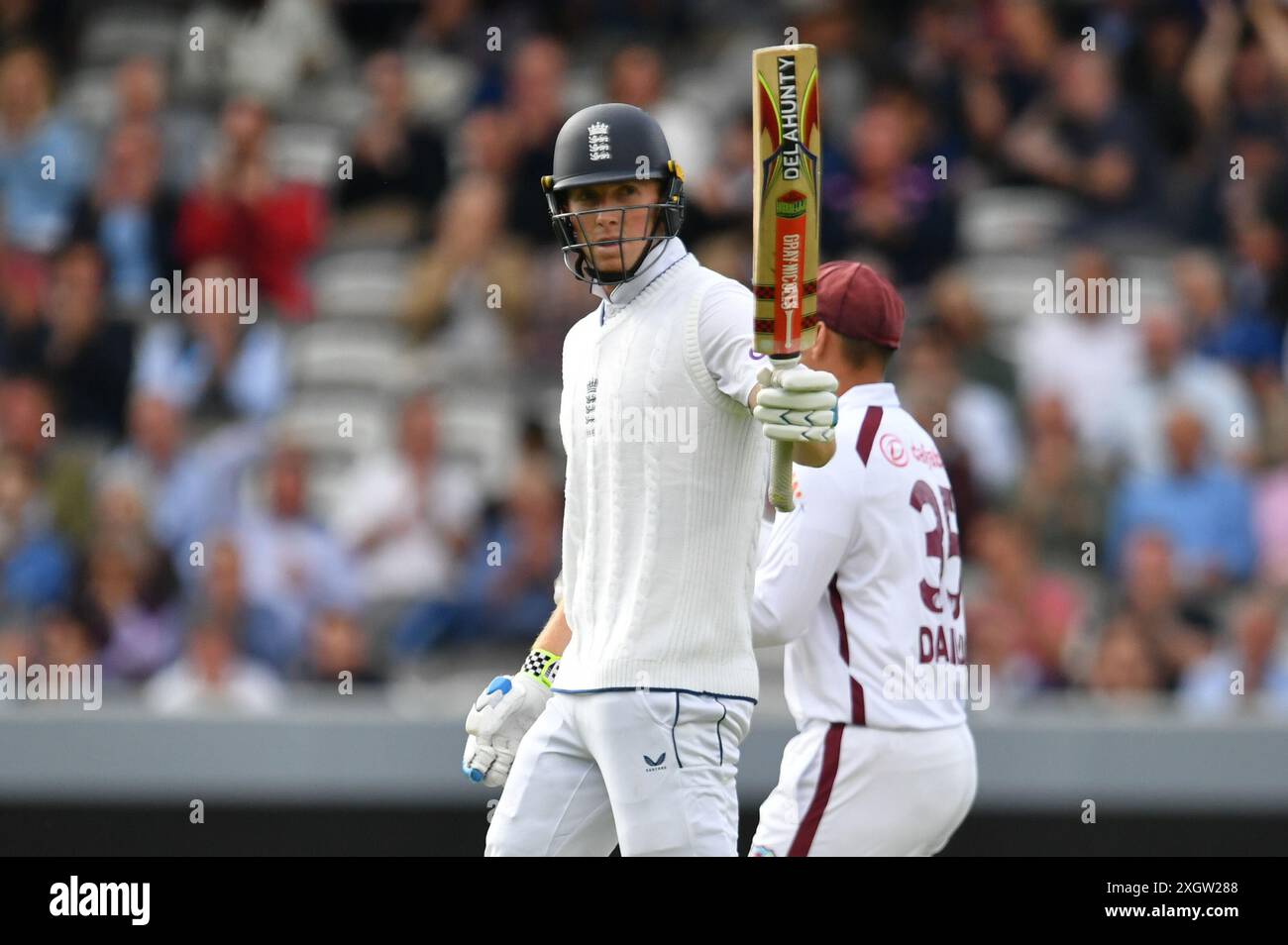 London, England. 10th July 2024. Zak Crawley celebrates reaching a half ...