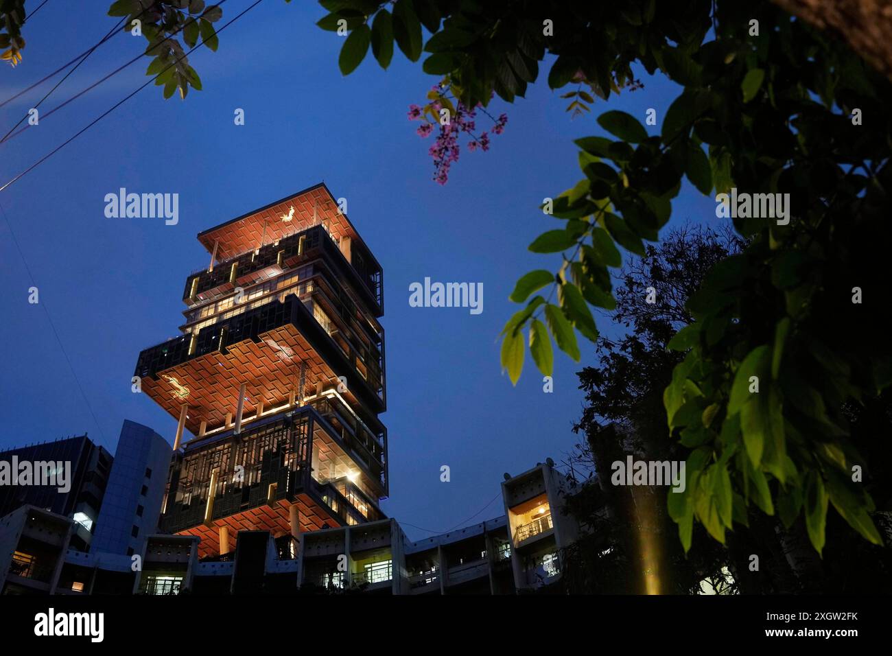 The Antilia mansion, house of billionaire Mukesh Ambani is lit up ahead ...