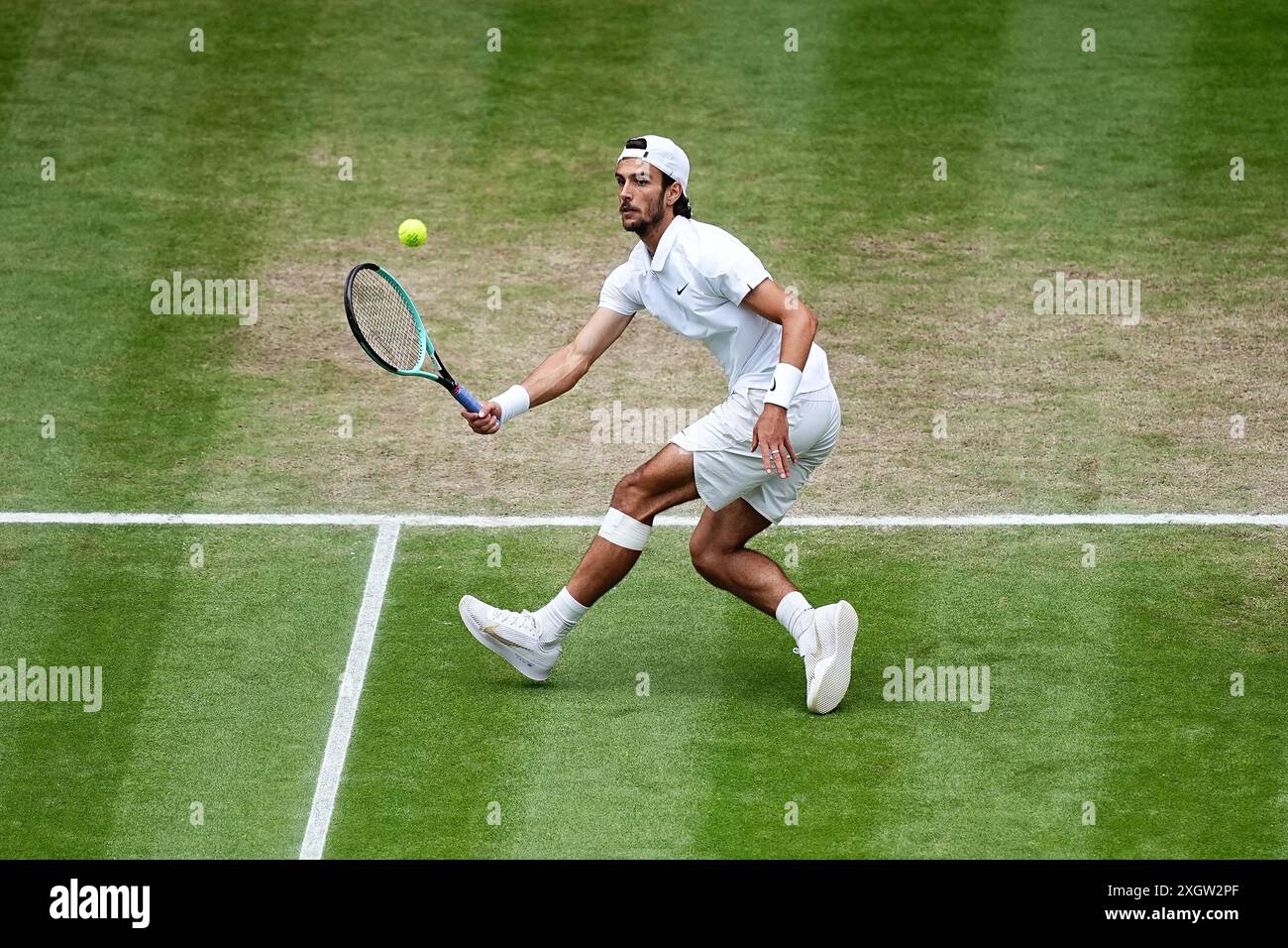 Lorenzo Musetti in action against Taylor Fritz (not pictured) on day ...