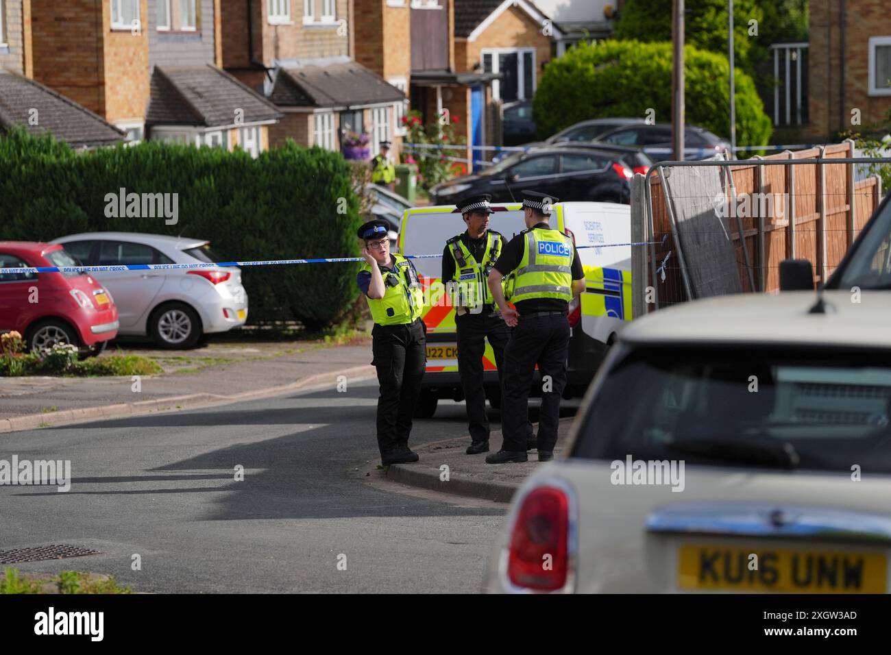 A view of police at the scene in Ashlyn Close, Bushey, Hertfordshire ...