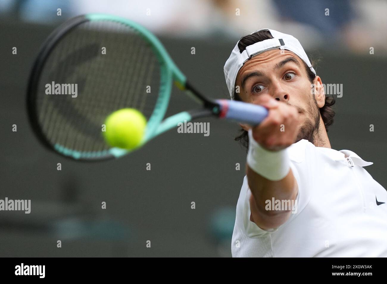 Lorenzo Musetti in action against Taylor Fritz (not pictured) on day ...