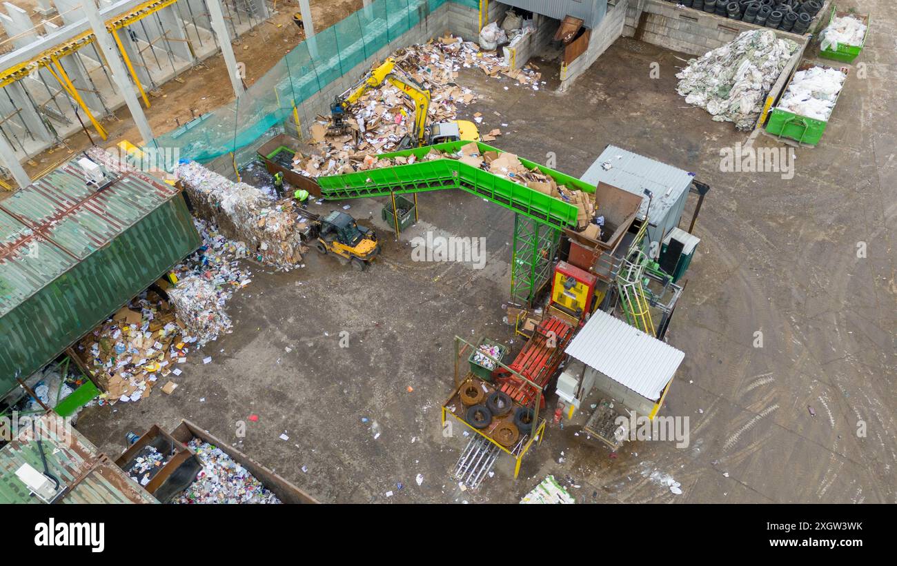 Drone photography of recycling center and machinery sorting material ...