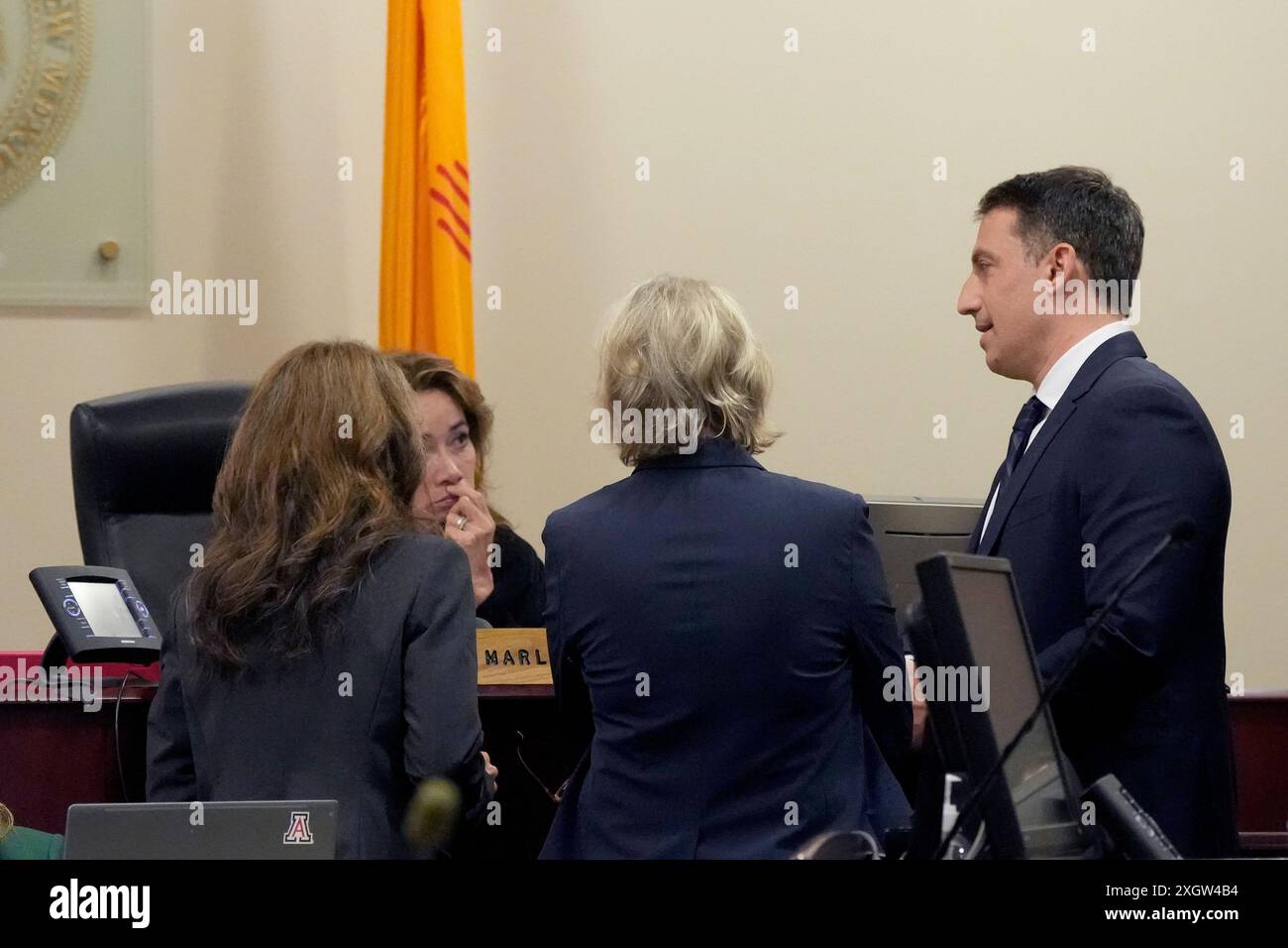 Judge Mary Marlowe Sommer speaks with, from left, prosecutors Erlinda ...