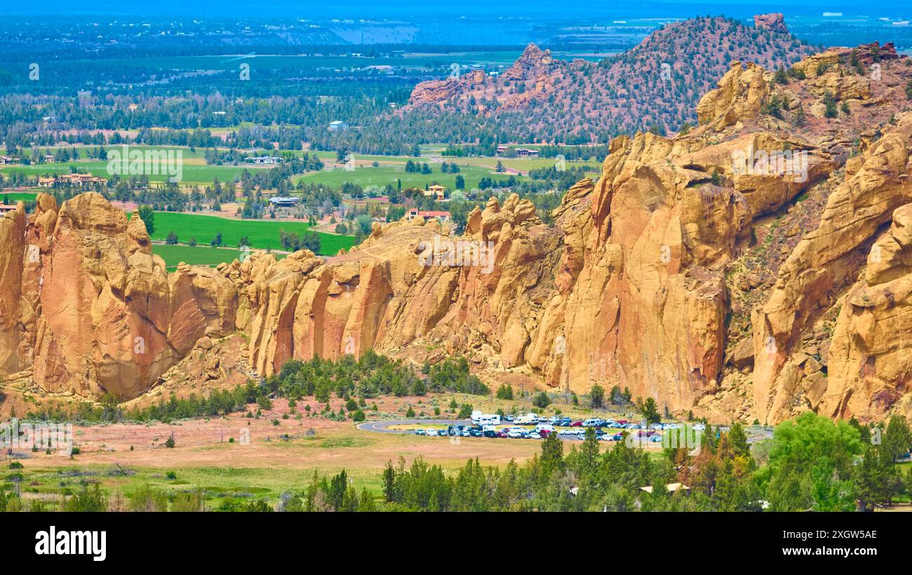 Aerial View of Smith Rock Cliffs Overlooking Lush Valley and Winding ...