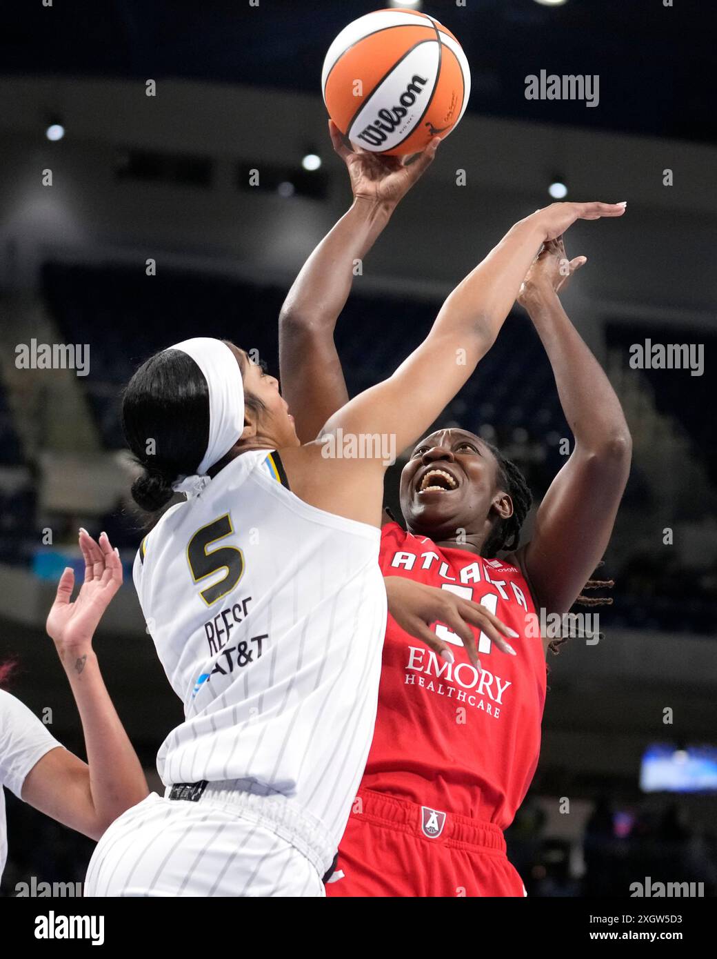 Atlanta Dream's Tina Charles (31) shoots over Chicago Sky's Angel Reese ...