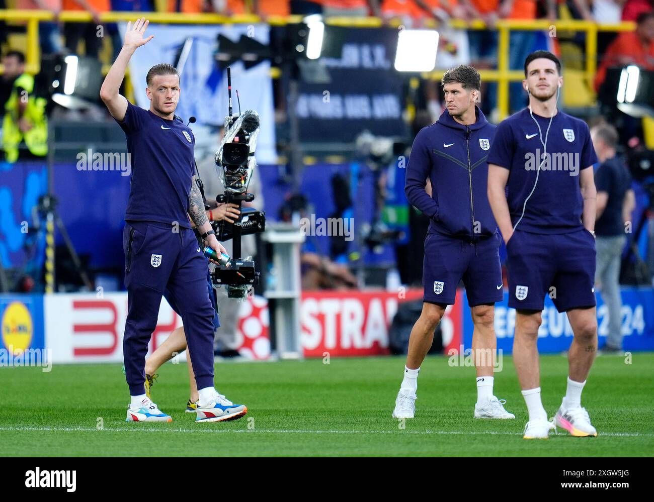 (Left to right) England's Jordan Pickford, John Stones and Declan Rice ...