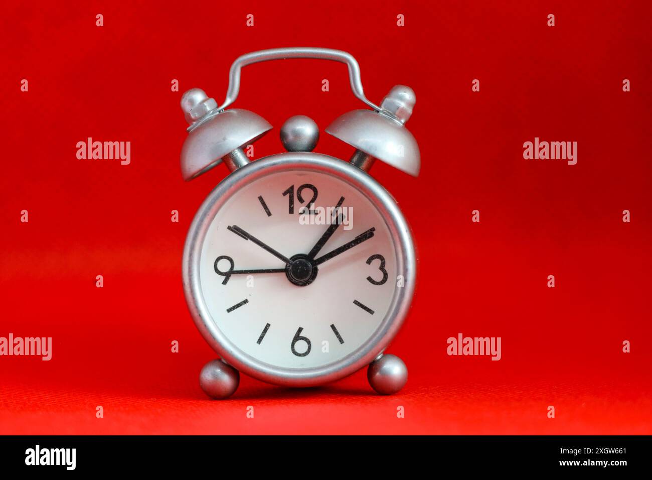 old-fashioned alarm clock with bells isolated working on time Stock ...