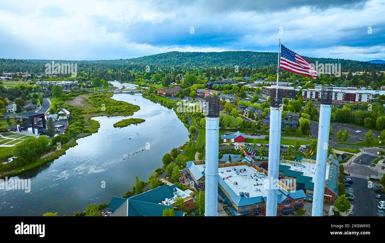 Aerial Fly Over American Flag Industrial Old Mill District River Bend ...