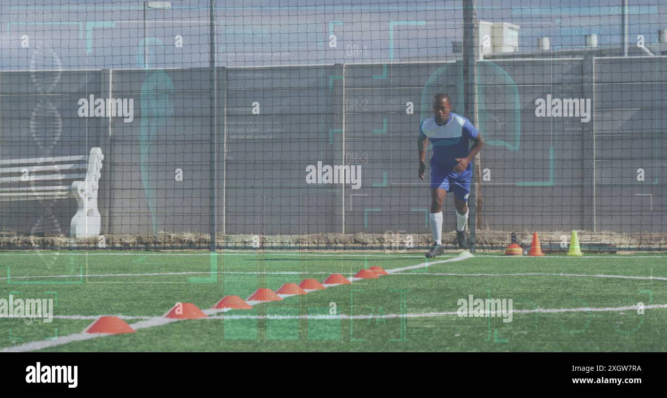 Image of interface processing data over biracial male footballer ...