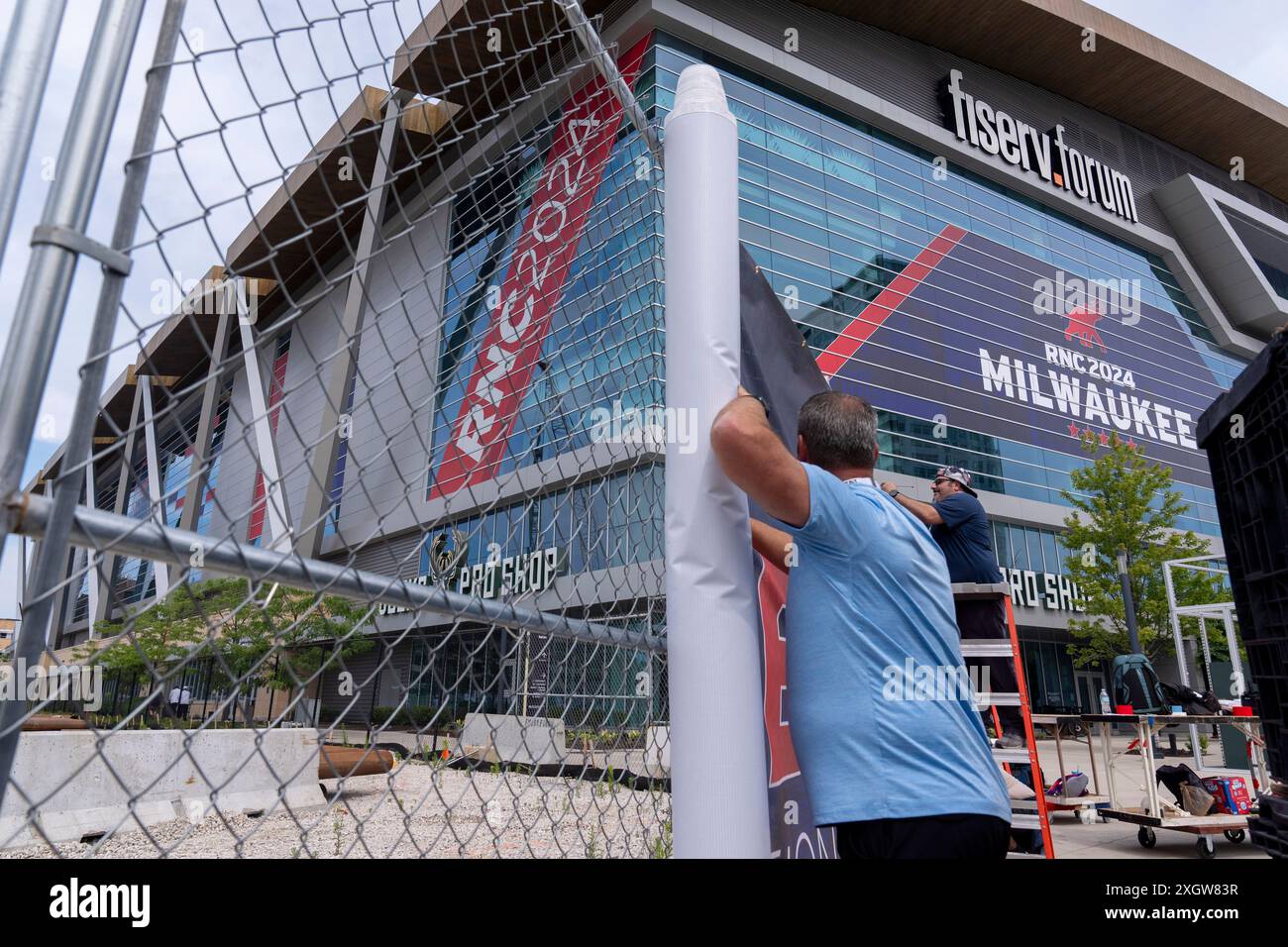 Signage is attached to security fencing ahead of the 2024 Republican ...