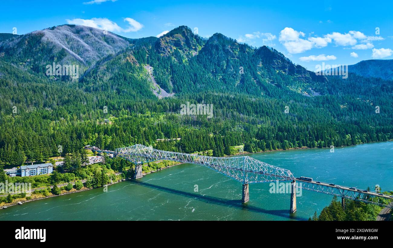 Aerial View of Steel Bridge Over River in Lush Mountain Valley Stock ...