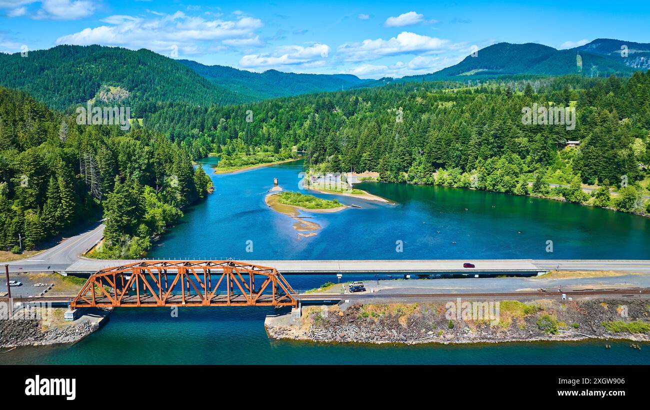 Aerial View of Wind River Bridge Over Lush Forest and Serene River ...