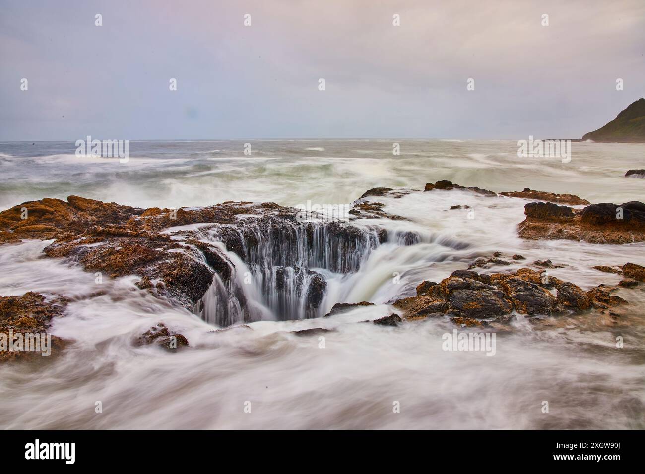 Dynamic Sea Waterfall at Thor's Well Oregon Eye-Level Perspective Stock ...